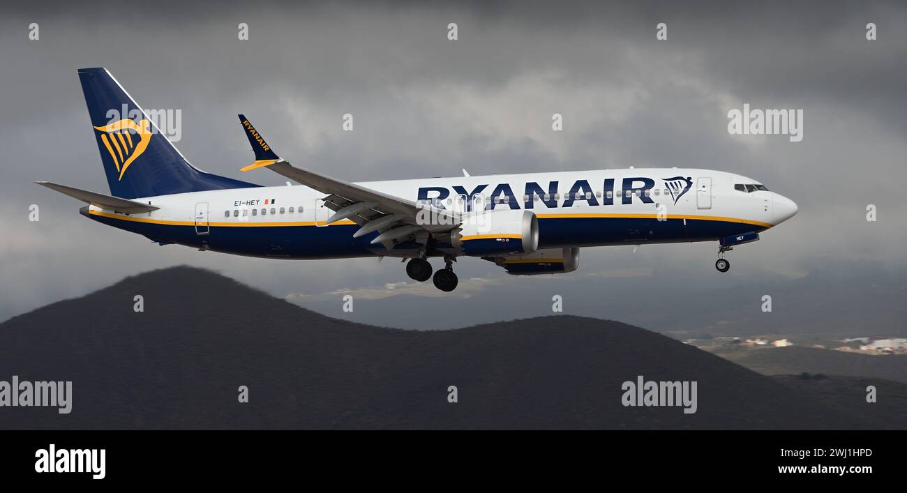 Tenerife, Spain February 11 st, 2024. Boeing 737 MAX 8-200 Ryanair Airlines flies in the dark ...