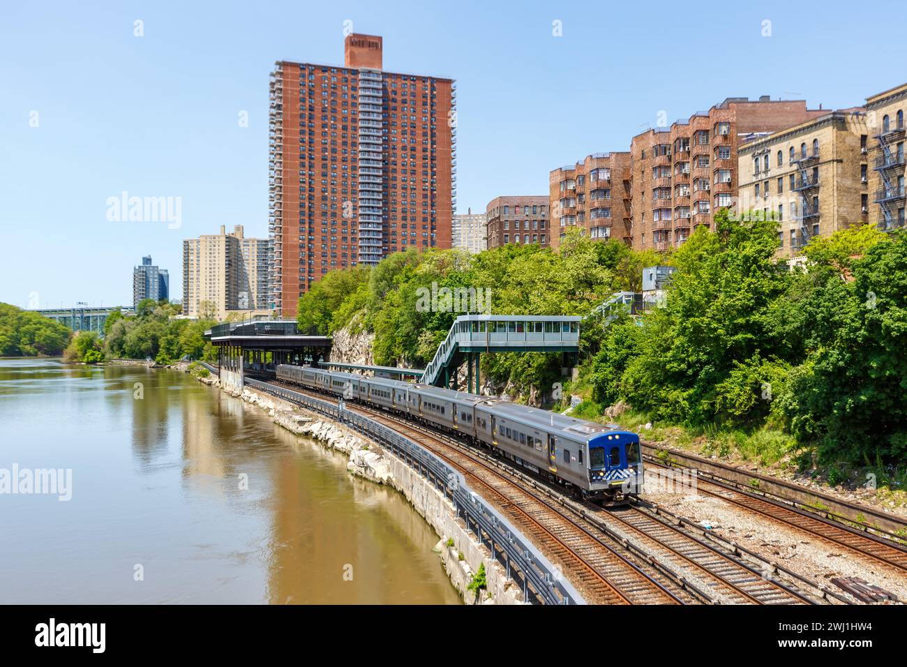 Metro-North Railroad commuter train at Marble Hill station in New York ...