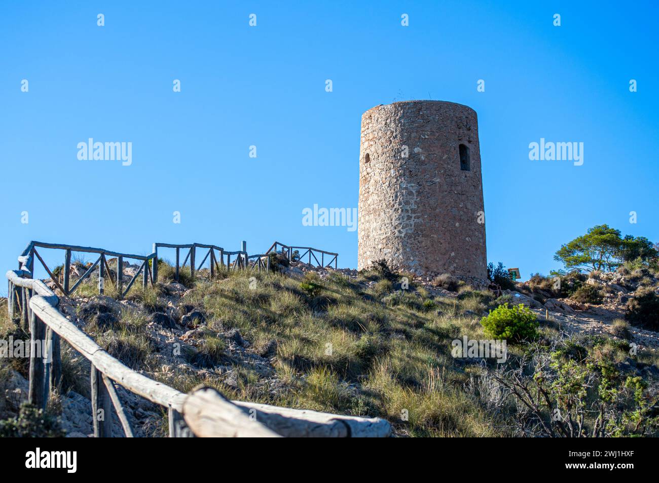 Mediterranean coastal landscape. Historic Torre Vigia De Cerro Gordo, a ...