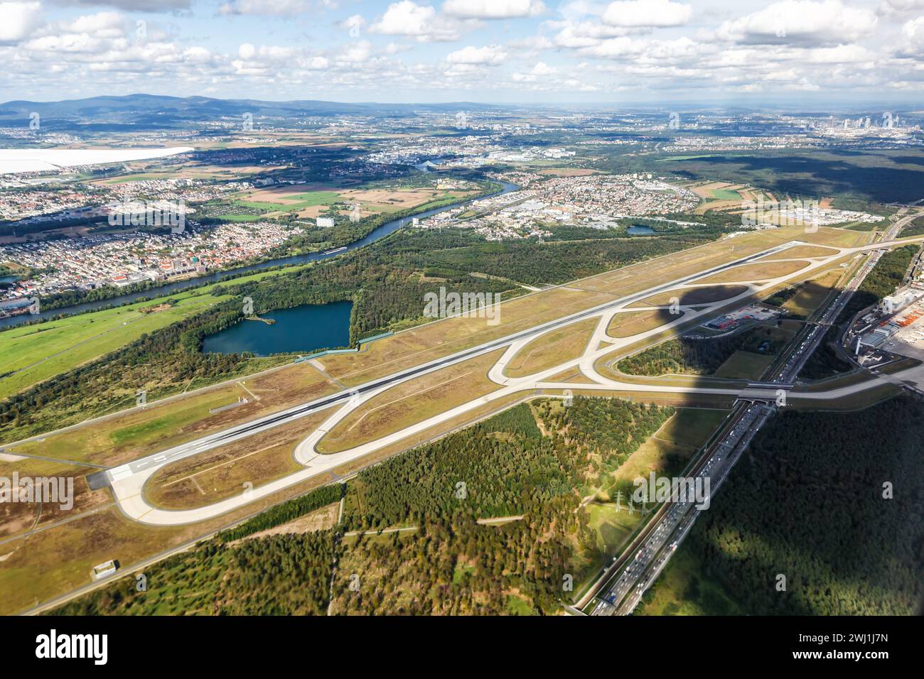 Aerial view of Frankfurt Airport with the northwest runway in Germany ...