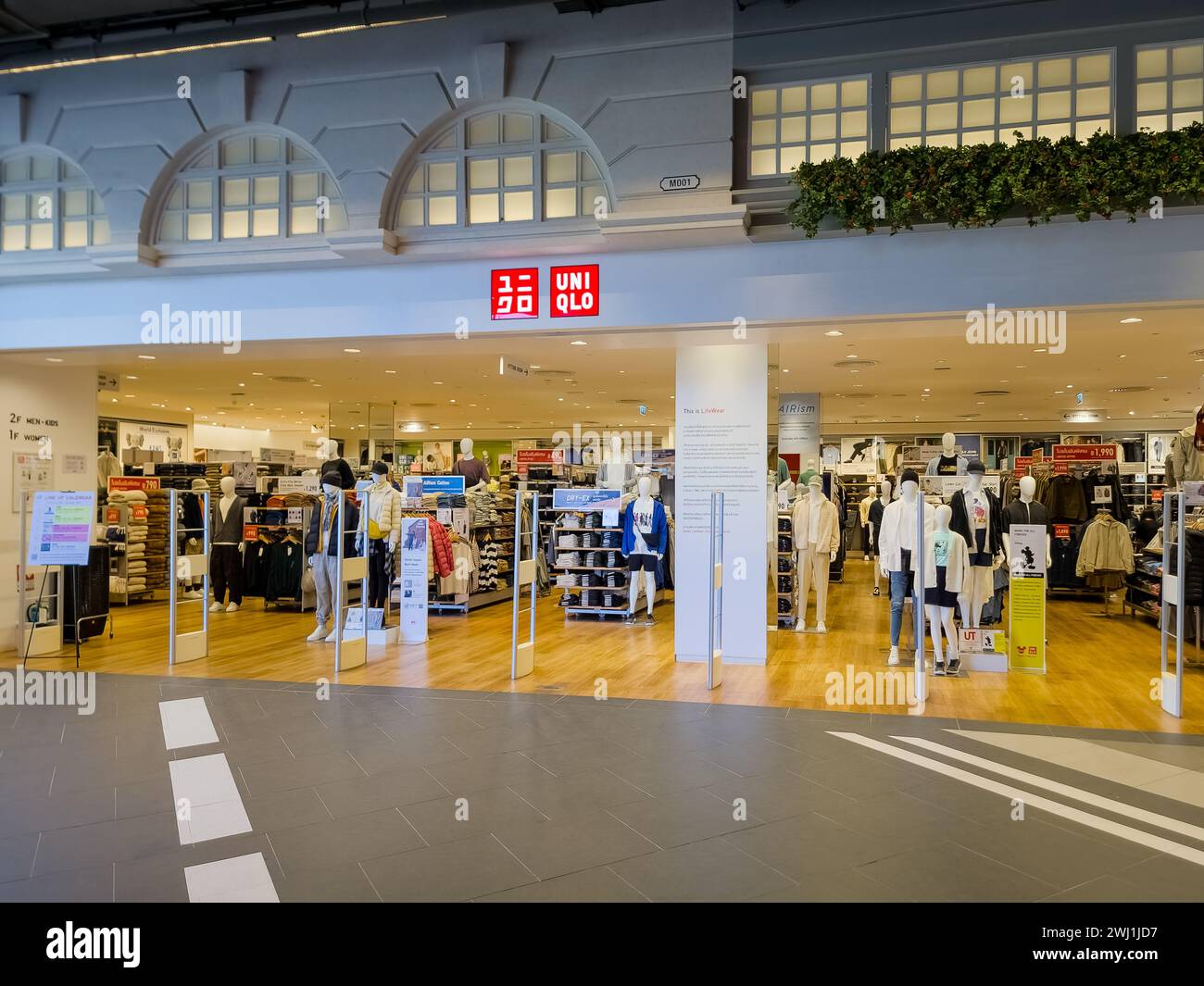 Shopping mall Terminal 21, Uniqlo sign in front of shopping store Stock ...