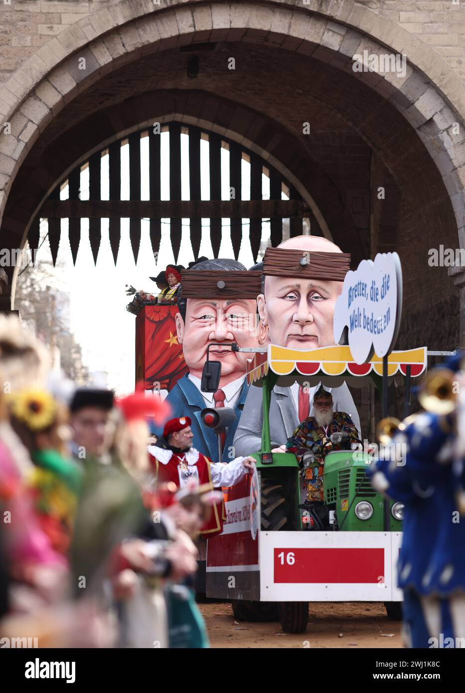 Cologne, Germany. 12th Feb, 2024. A float, "Boards that mean the world ...