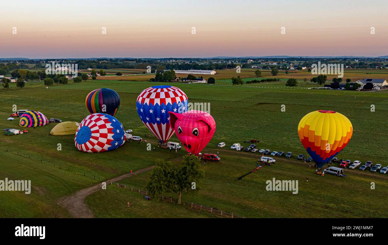 Aerial View of a Line of Hot Air Balloons Getting Ready for an Early ...