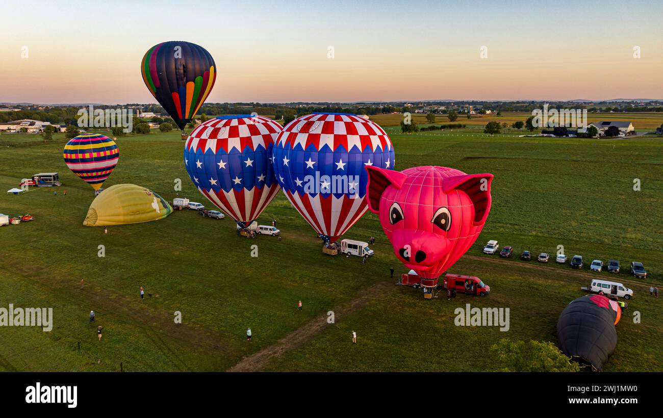 Aerial View of a Line of Hot Air Balloons Getting Ready for an Early ...