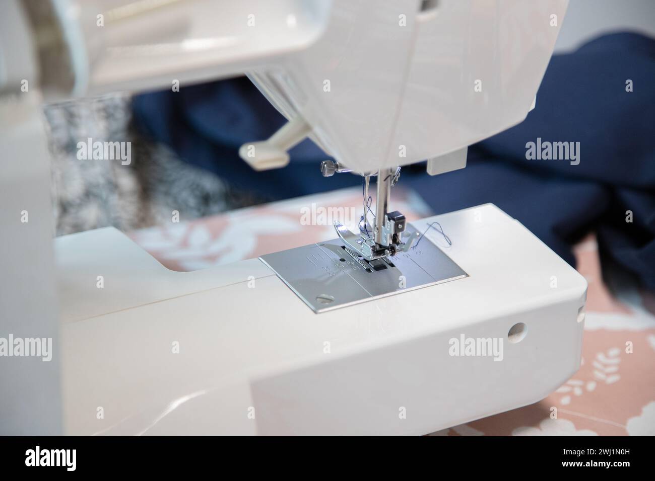 Close-up view of the components of the sewing machine, part of the ...
