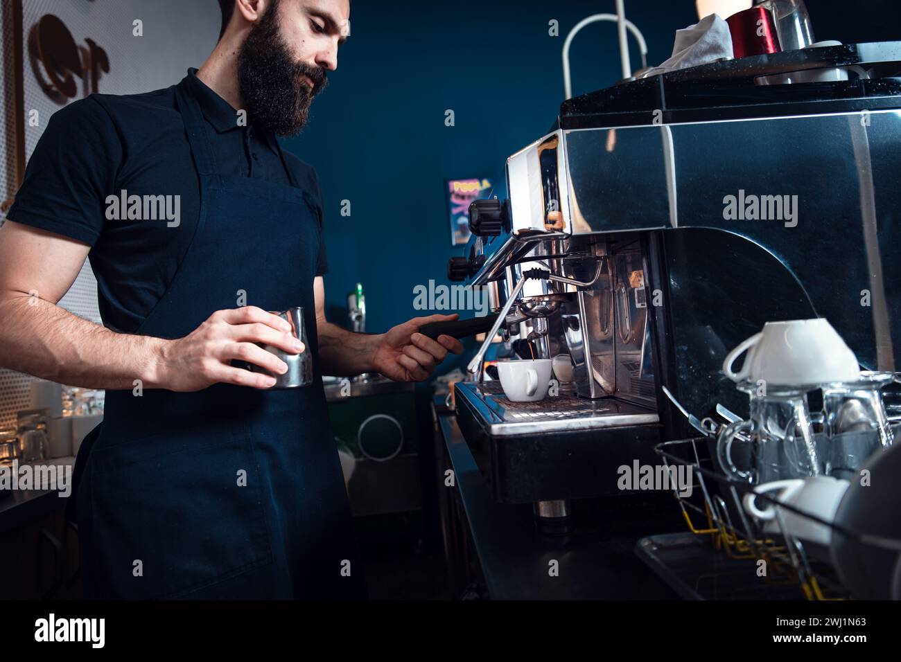 Barista preparing cappuccino on espresso machine for customer in coffee ...