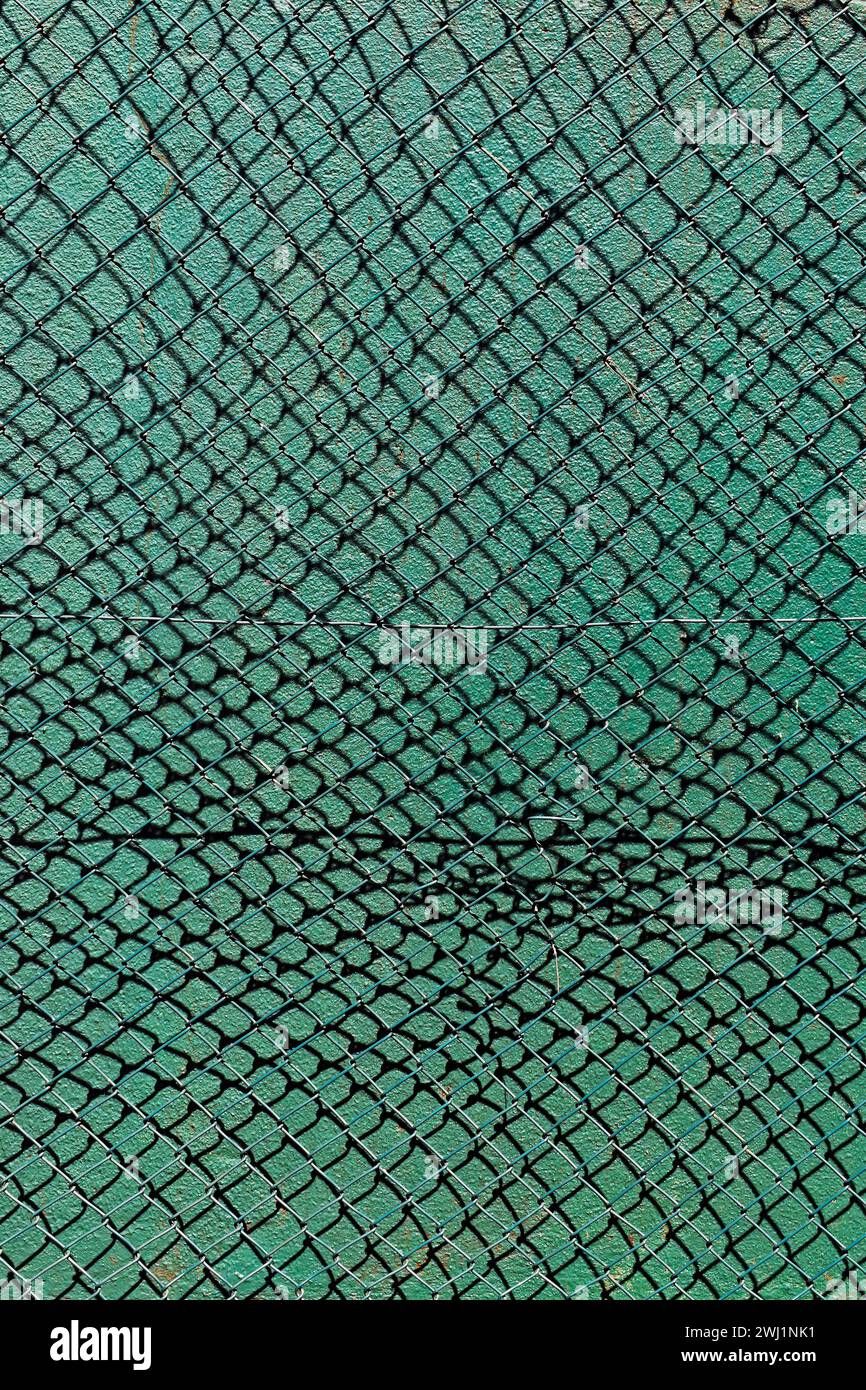 Green mesh, rhombus grid on green background Stock Photo - Alamy
