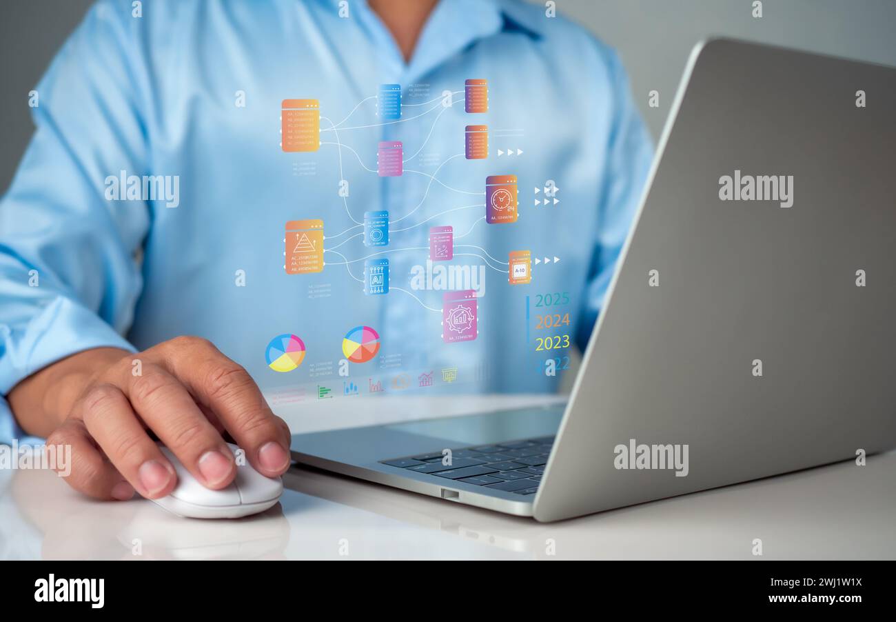 Business people use computers to analyze business and manage corporate ...