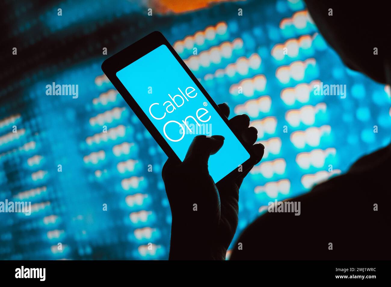 In this photo illustration, the Cable One, Inc. logo is displayed on a ...