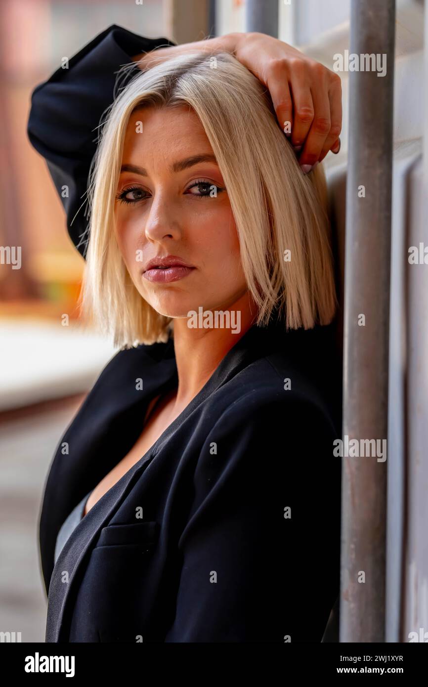 A Lovely Blonde Model Poses Outdoor While Enjoying The Spring Weather ...