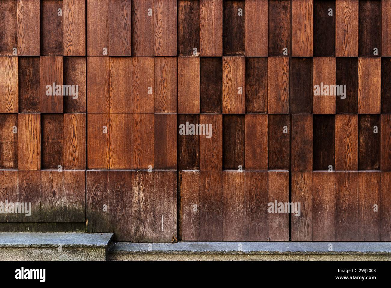 Wooden block wall providing unique backdrop for design Stock Photo - Alamy