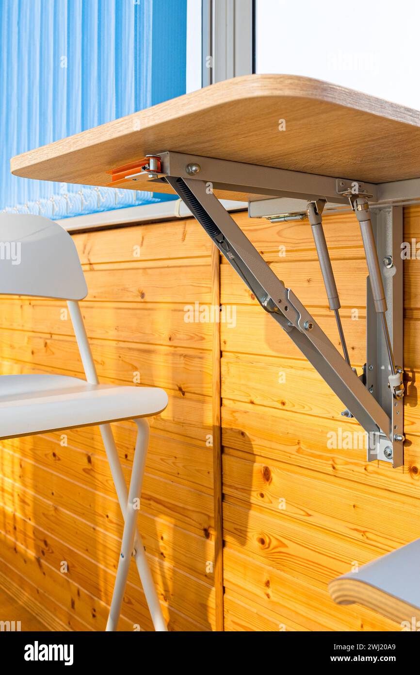 folding table attached to the wall of the balcony. folding wall table ...