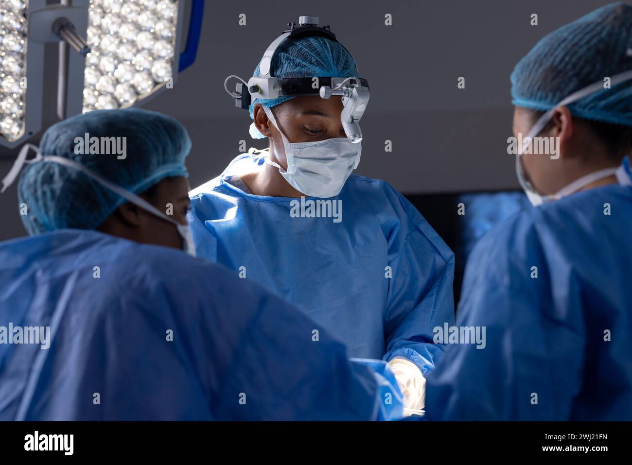 Asian female surgeon in operating room hi-res stock photography and ...