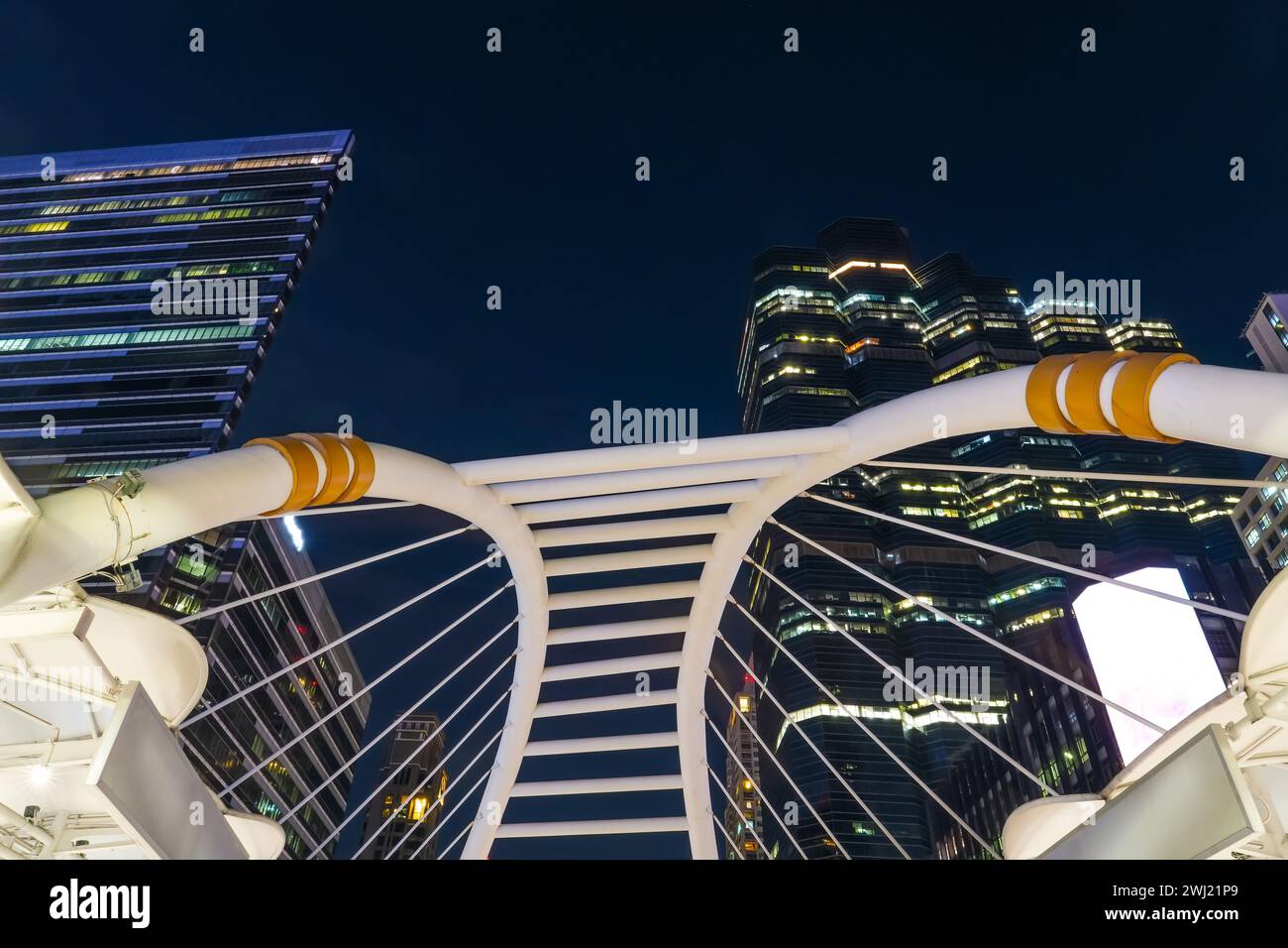 View of public sky walk backlight at Chong Nonsi pedestrian bridge in ...