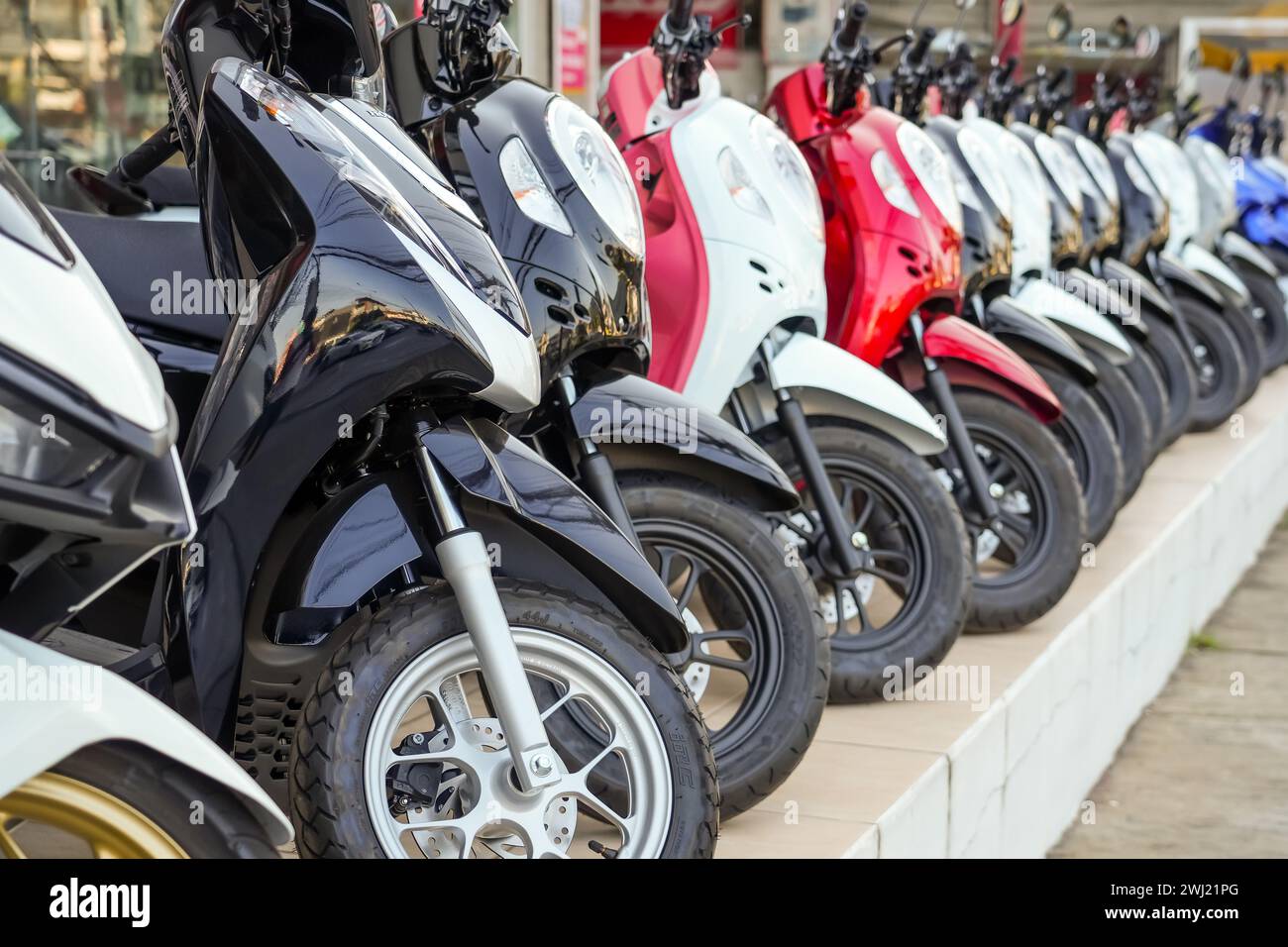 The front of the colorful motorcycles at the showroom, Motorcycles are ...