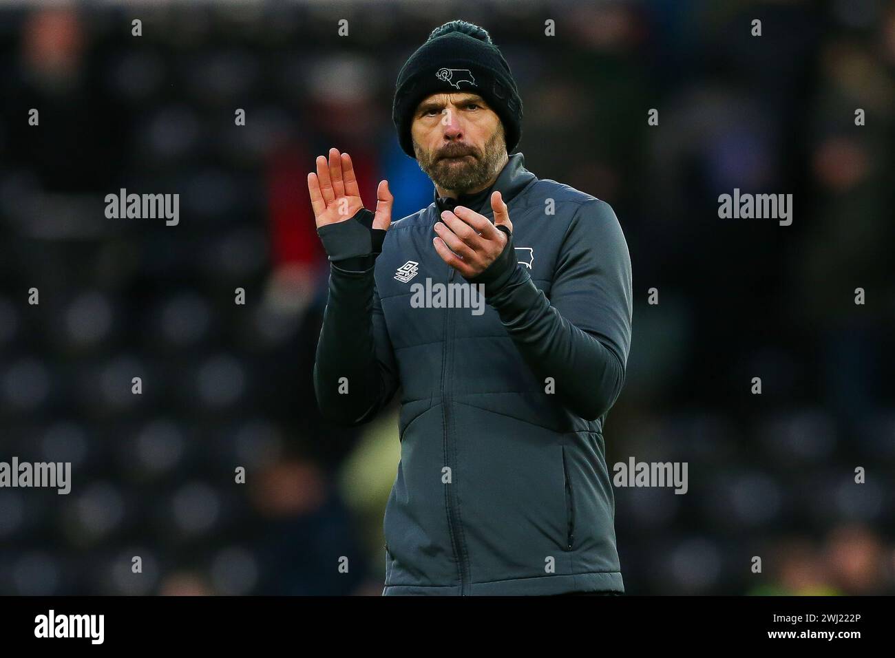 Derby County manager Paul Warne applauds the fans at the end of the Sky ...