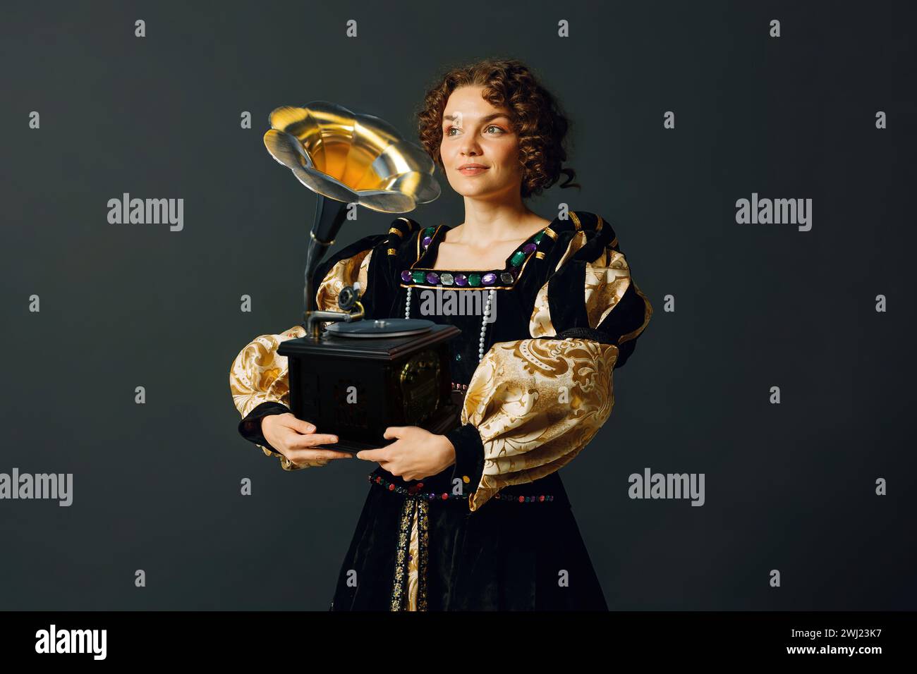 Portrait of a young aristocratic woman dressed in a medieval dress ...