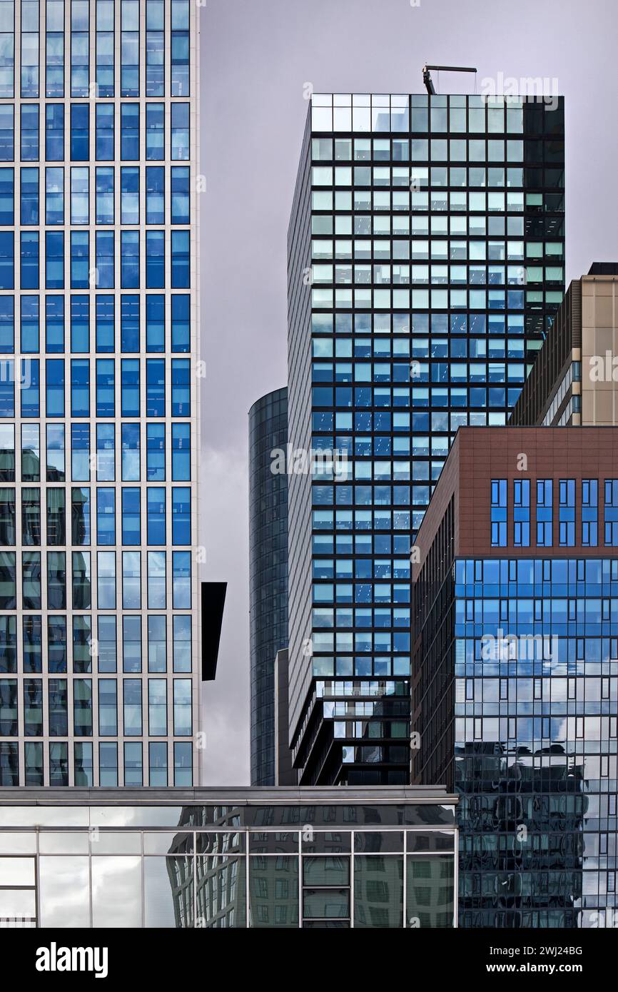 High-rise buildings standing close together in the financial district ...