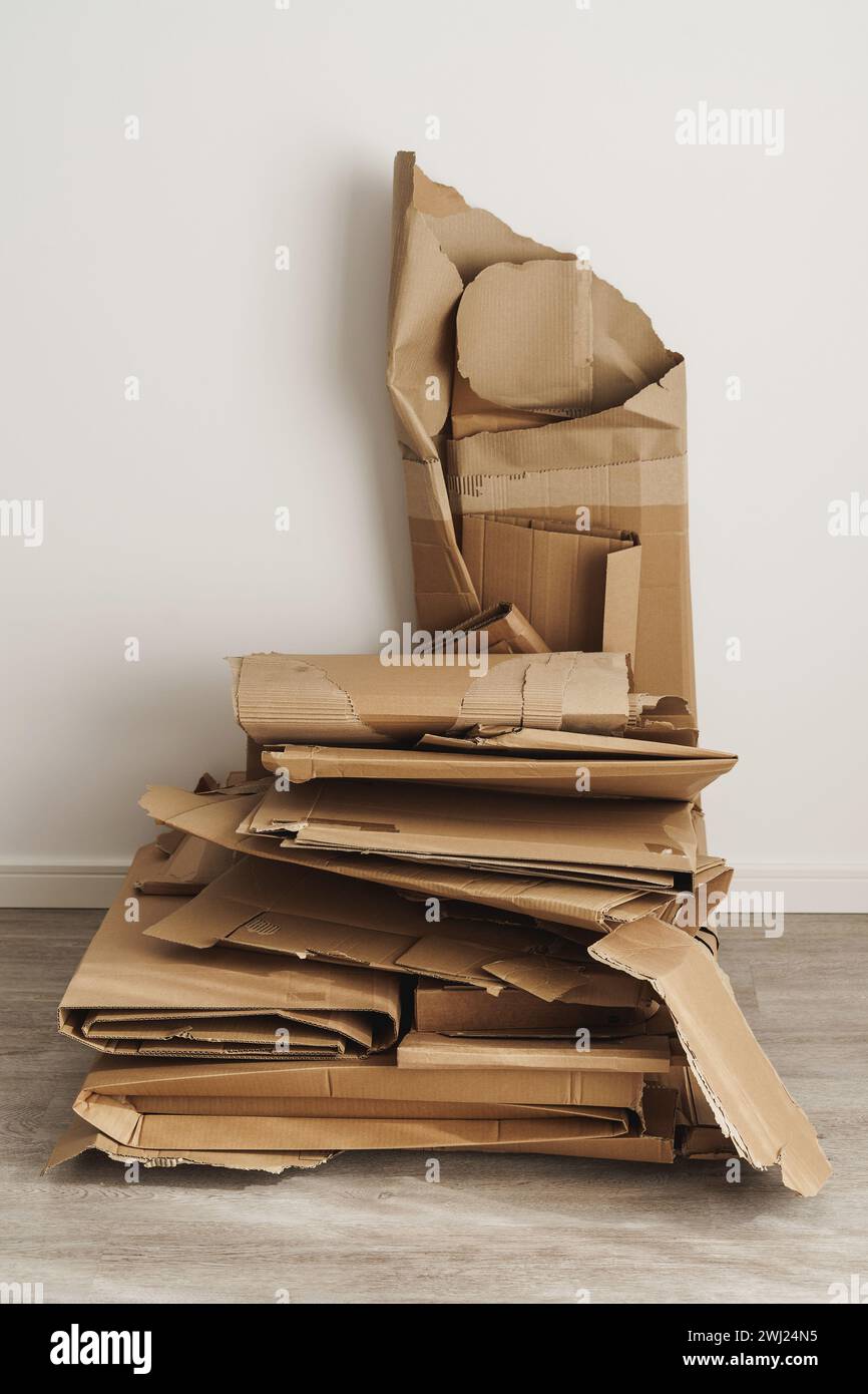 Stack of Cardboard Waste at home. Concepts of Paper Recycling and Waste ...