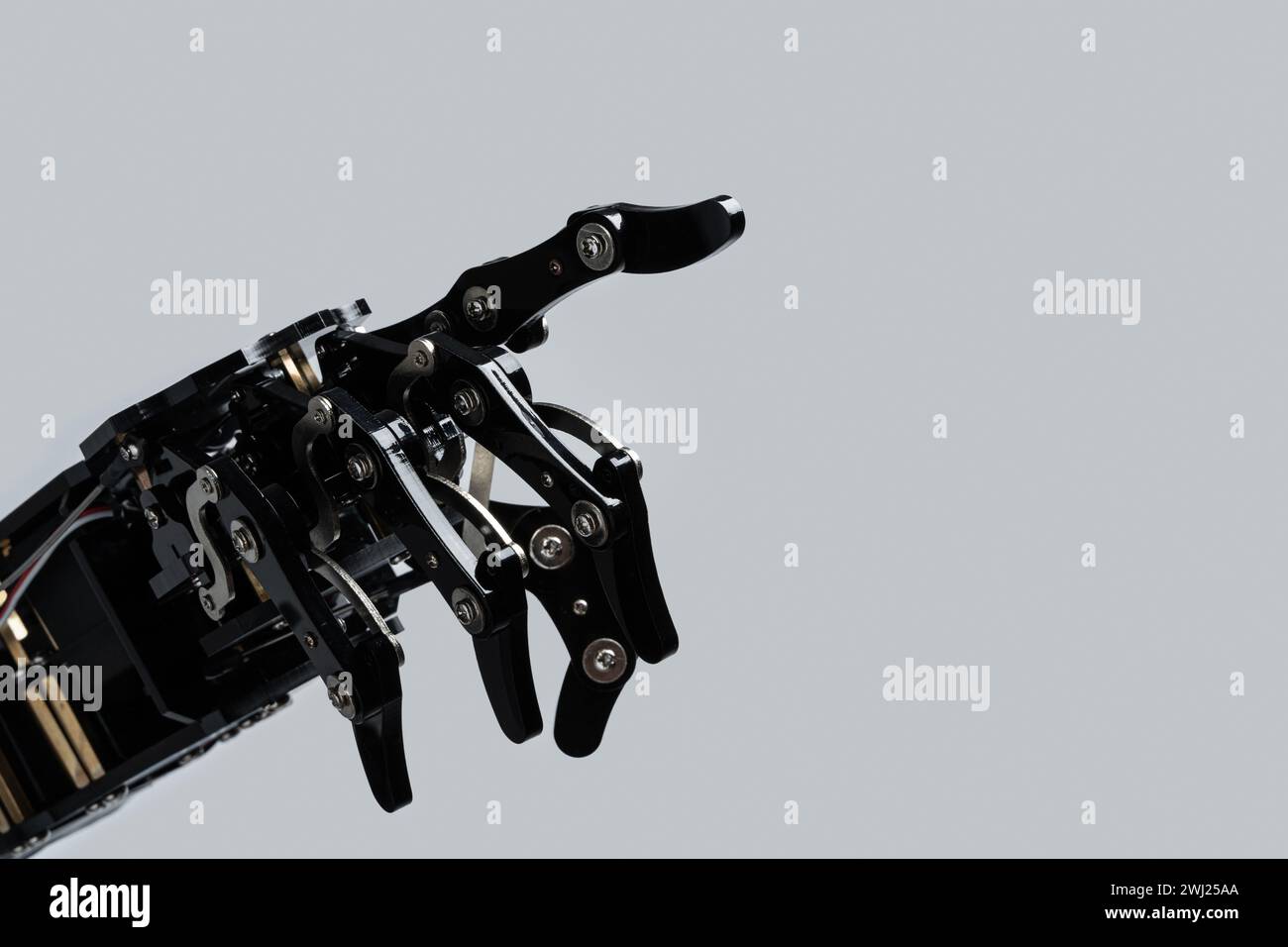 Real robot's hand pointing or pushing on something. Concepts of AI ...