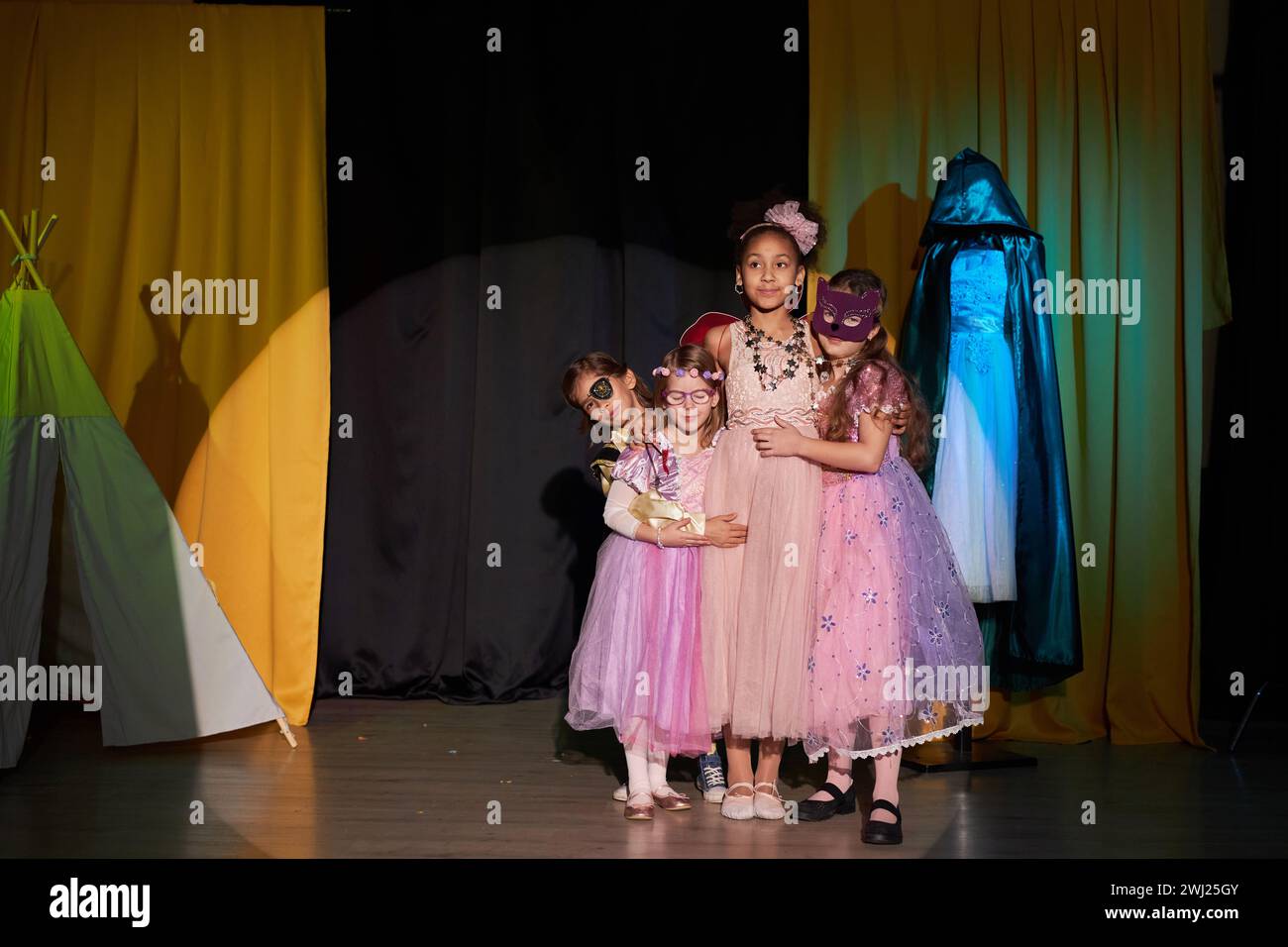 Full length portrait of group of young children wearing costumes ...