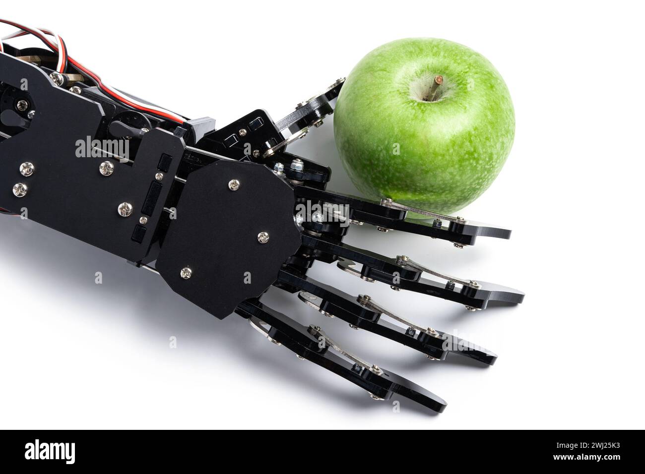 Real robot's hand with green apple. Concept of Artificial intelligence ...