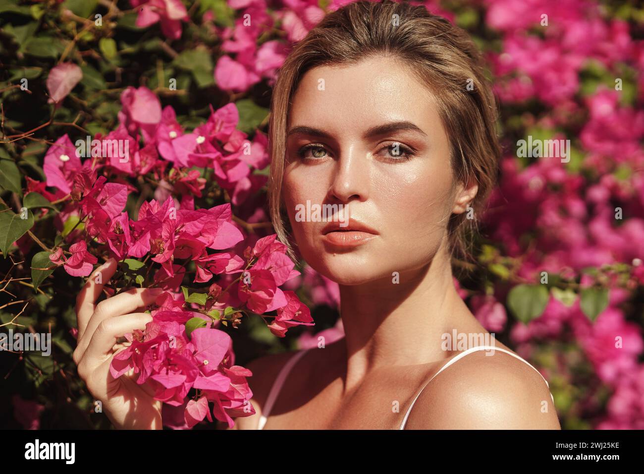 Beautiful blonde woman with smooth skin and natural makeup, as she ...