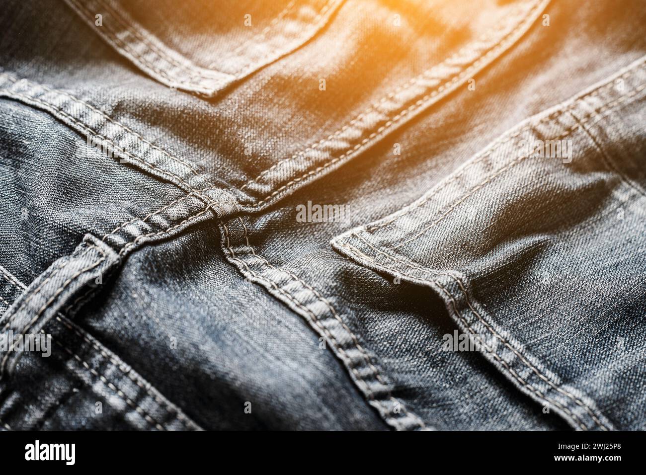 Closeup of black jeans surface Stock Photo - Alamy