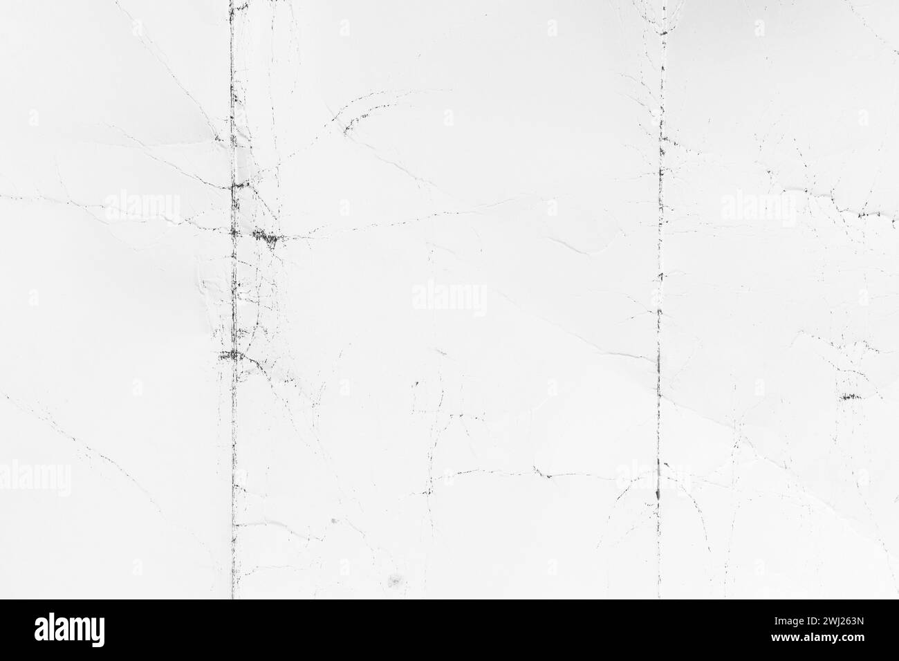 Crumpled white cardboard with wrinkles and wrinkled folds. Old wrapping ...