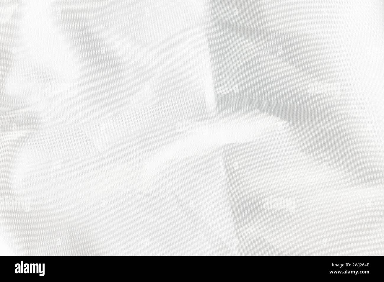 Abstract white synthetic material with wrinkles and wrinkled folds. Old ...