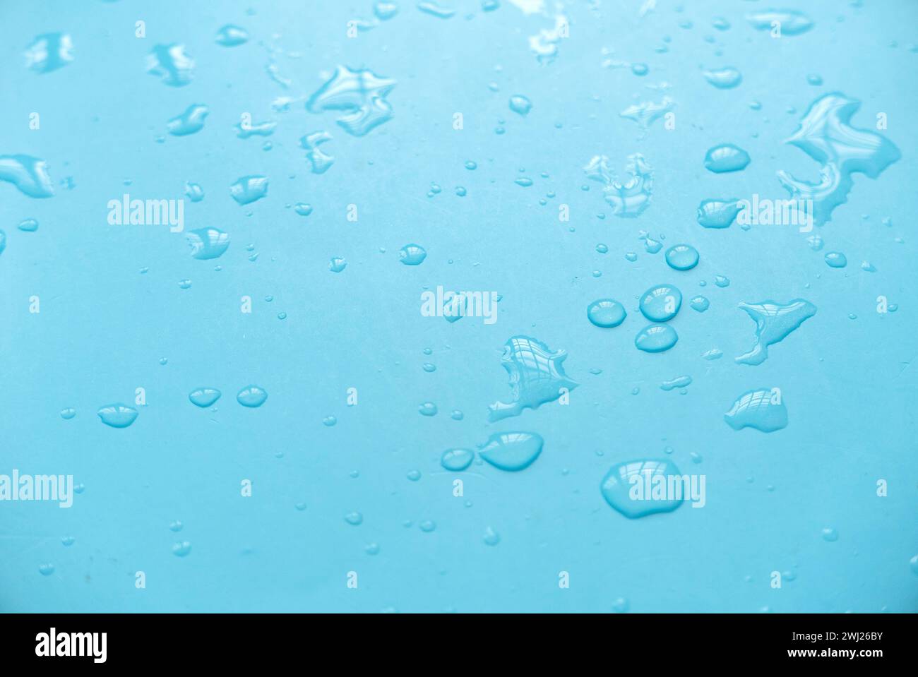 Water drops over a blue background for creative poster design Stock ...