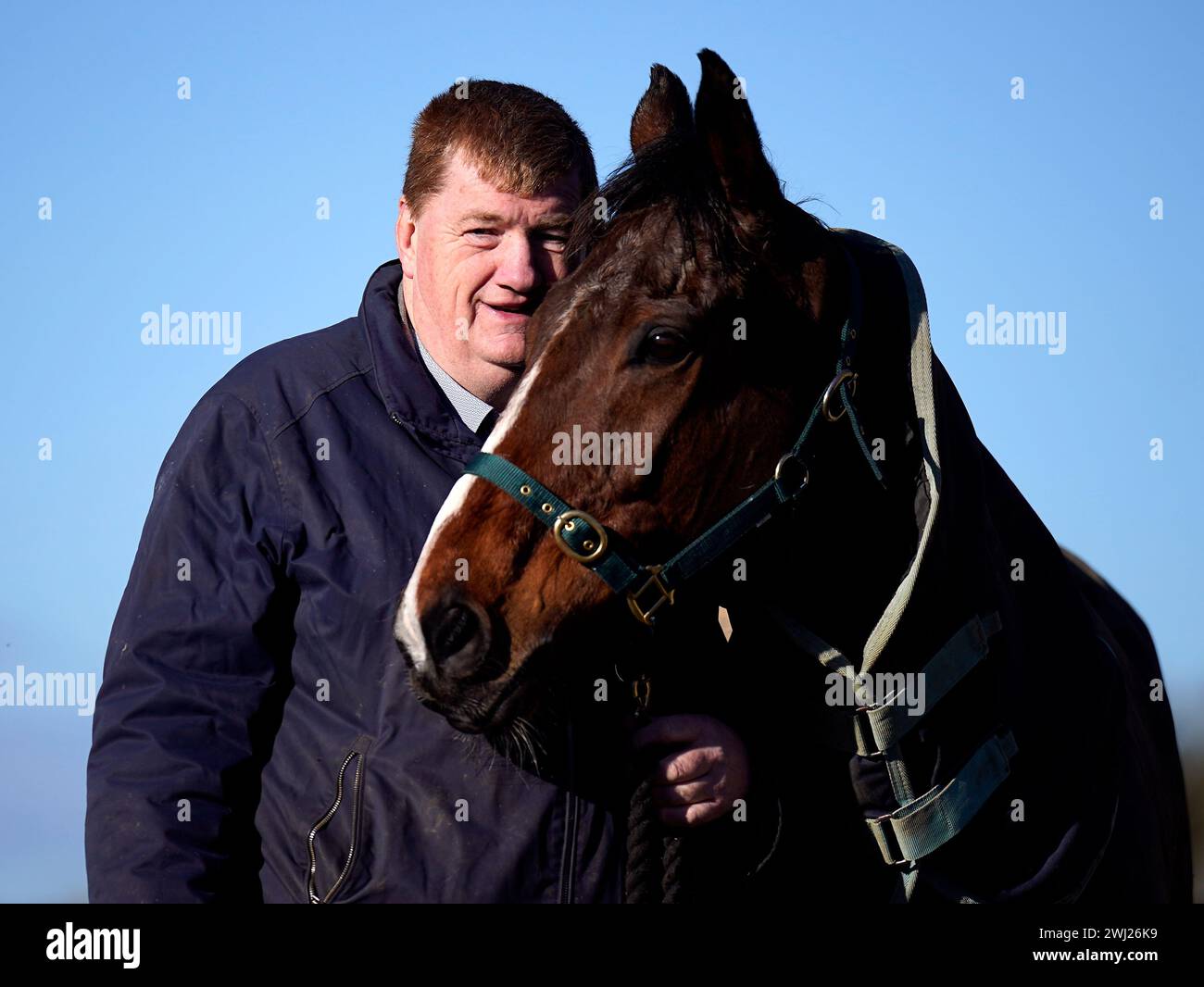 Trainer John "Shark" Hanlon with horse Hewick during a media day at ...