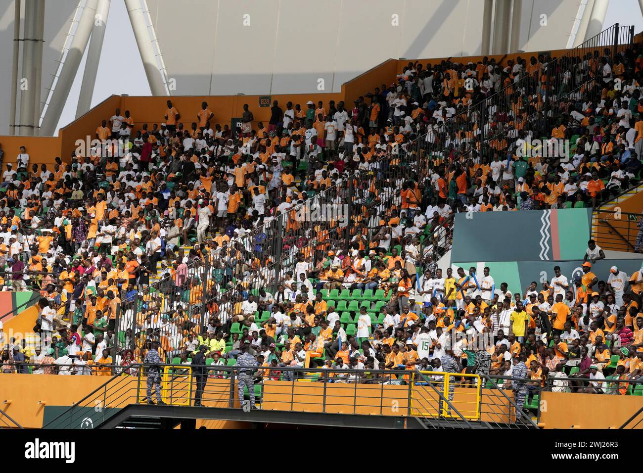 Ivory Coast supporters wait for their team to arrive at the Felix ...