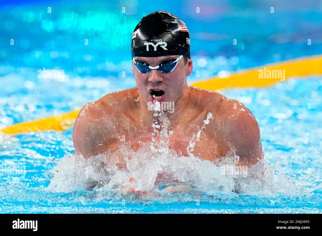 Nic Fink of the United States competes in the men's 100-meter ...
