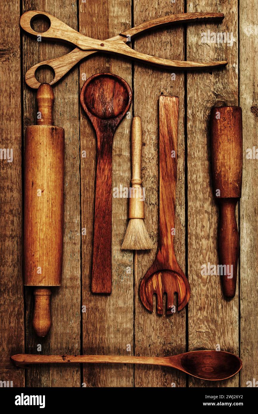Set of various wooden kitchen utensils on the table Stock Photo - Alamy