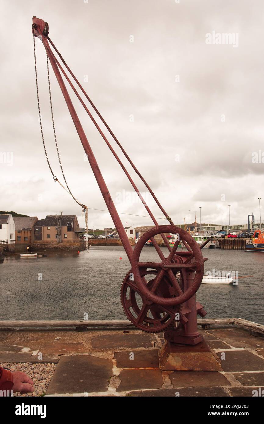 Harbour pier crane, on the harbour side at Stromness harbour, Orkney ...