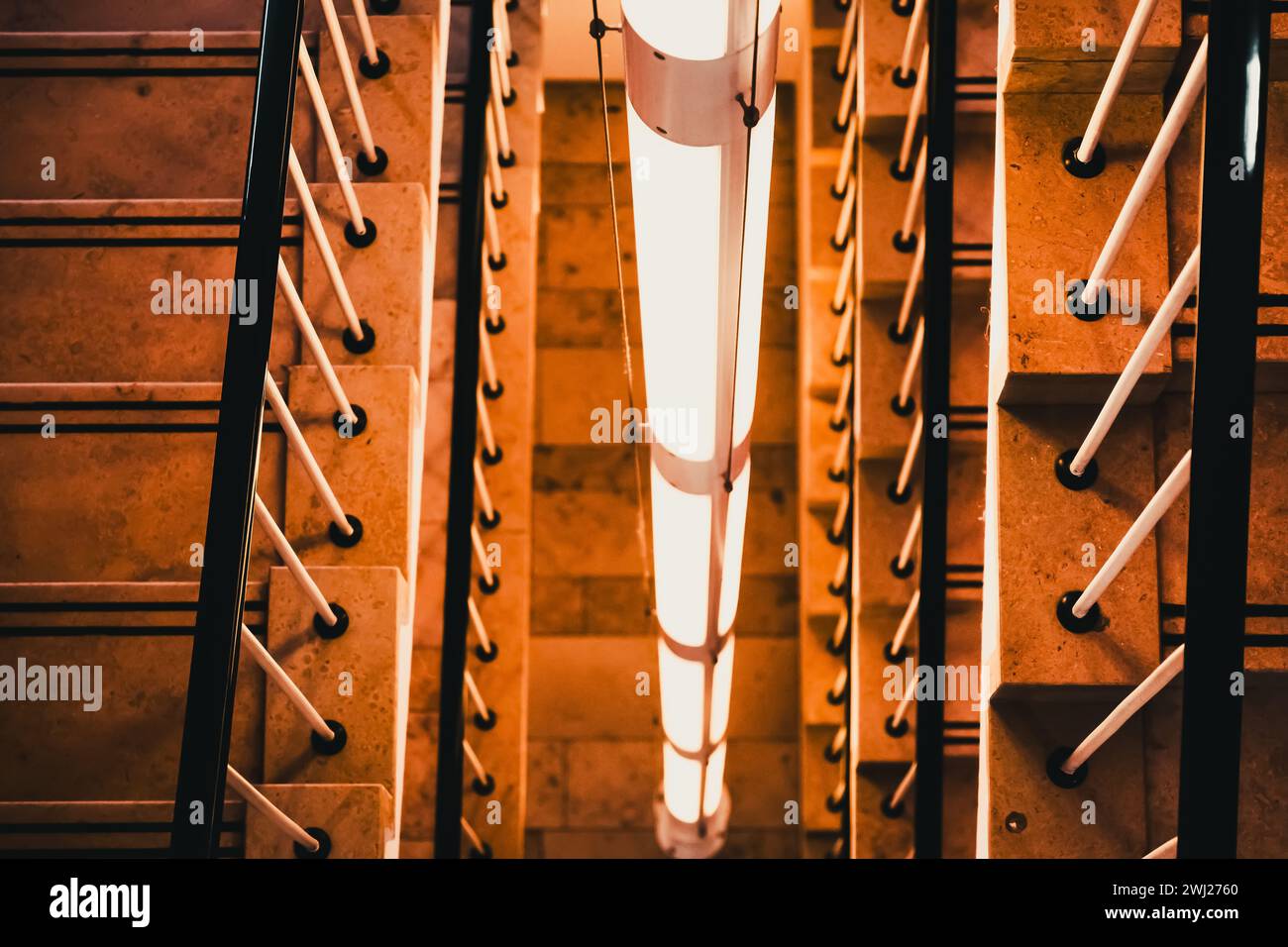 Rectangular staircase with light column, view from above, vertical ...