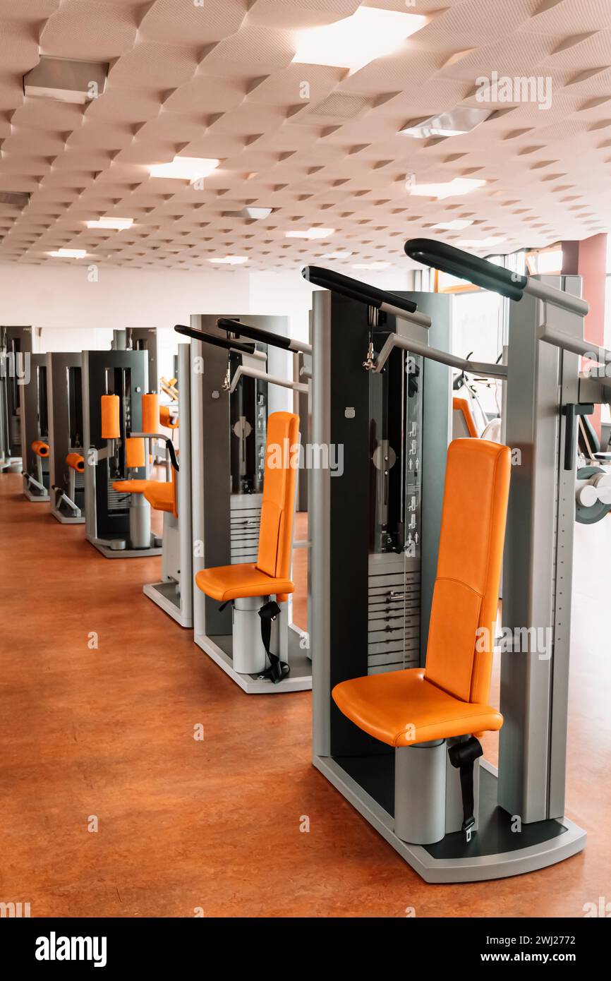 Exercise machine for strength training for arms in weight room ...