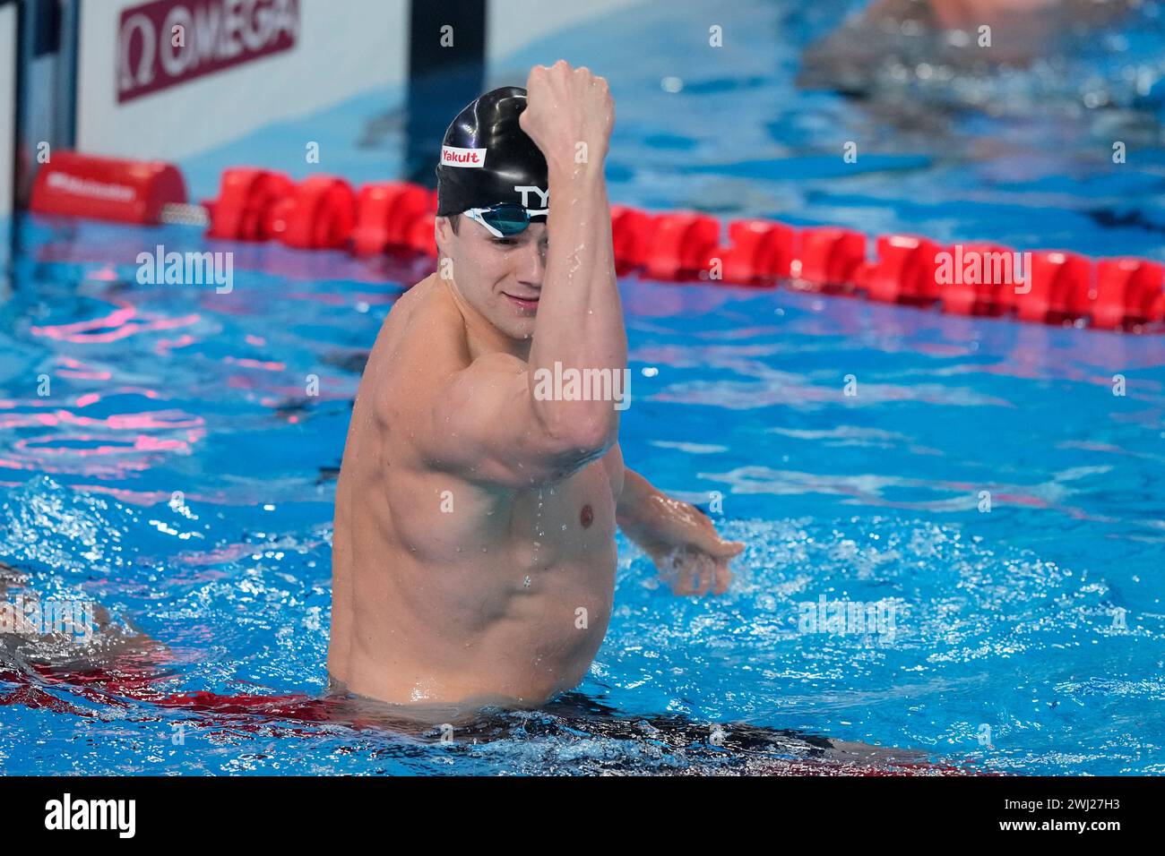 Nic Fink of the United States reacts after competing the men's 100 ...