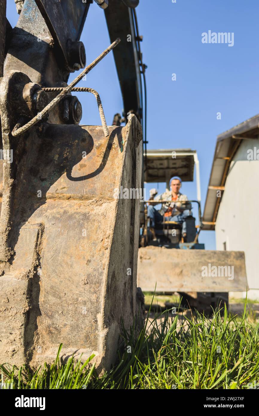 Male operating excavator hi-res stock photography and images - Alamy
