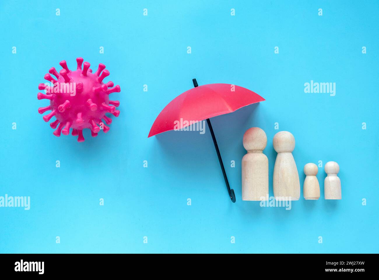 Family health and life insurance concept. Wooden people represent ...