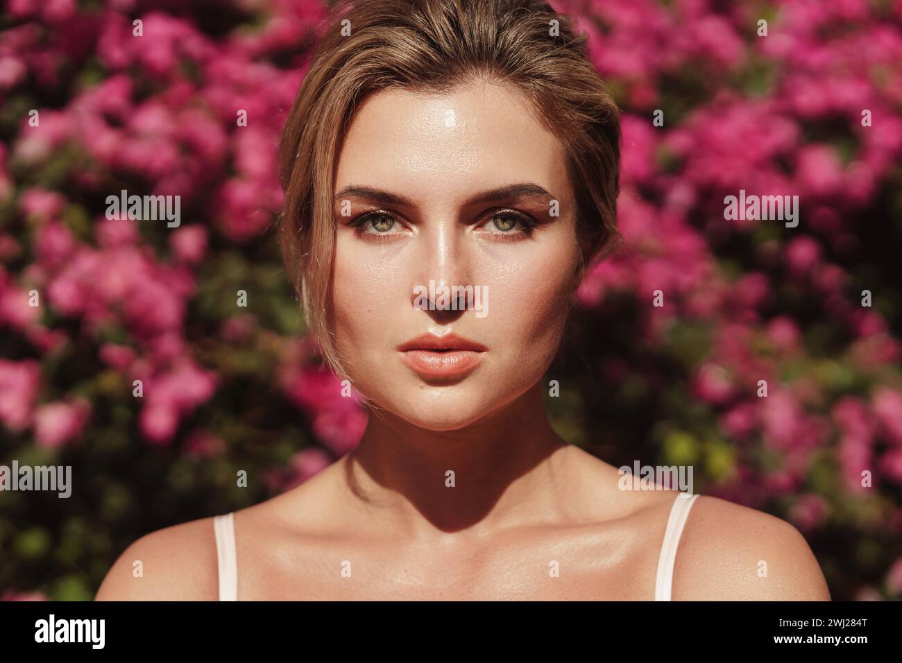 Beautiful blonde woman with smooth skin and natural makeup, as she ...