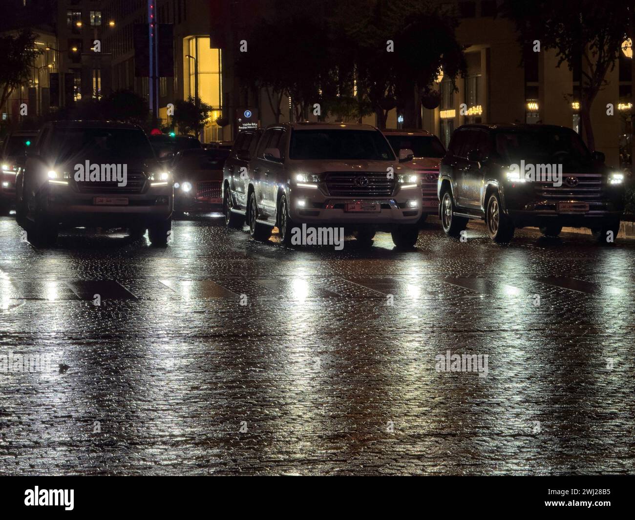 Doha, Qatar - February 11, 2024: Rainy Street in the Musherib at night ...