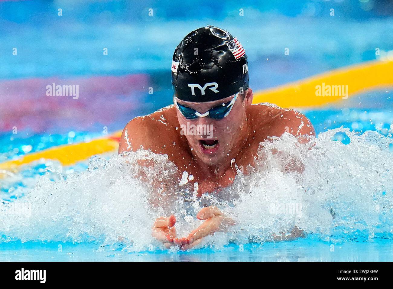 Nic Fink of the United States competes in the men's 100-meter ...