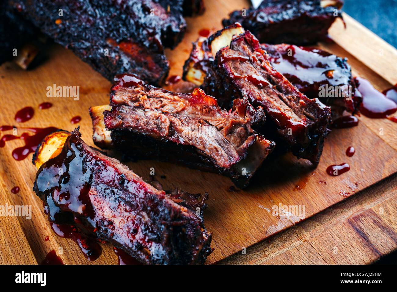 Traditional barbecue burnt chuck beef ribs marinated with spicy rub and ...