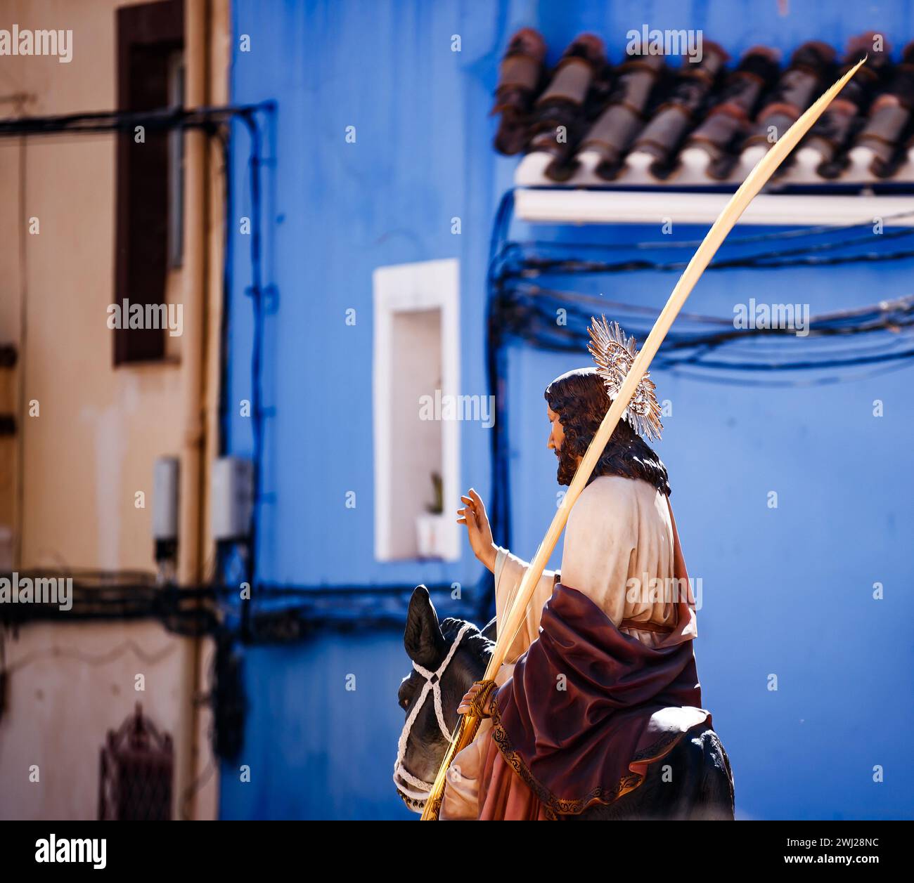 Jesus Christ on donkey in the Palm Sunday procession in Villajoyosa ...