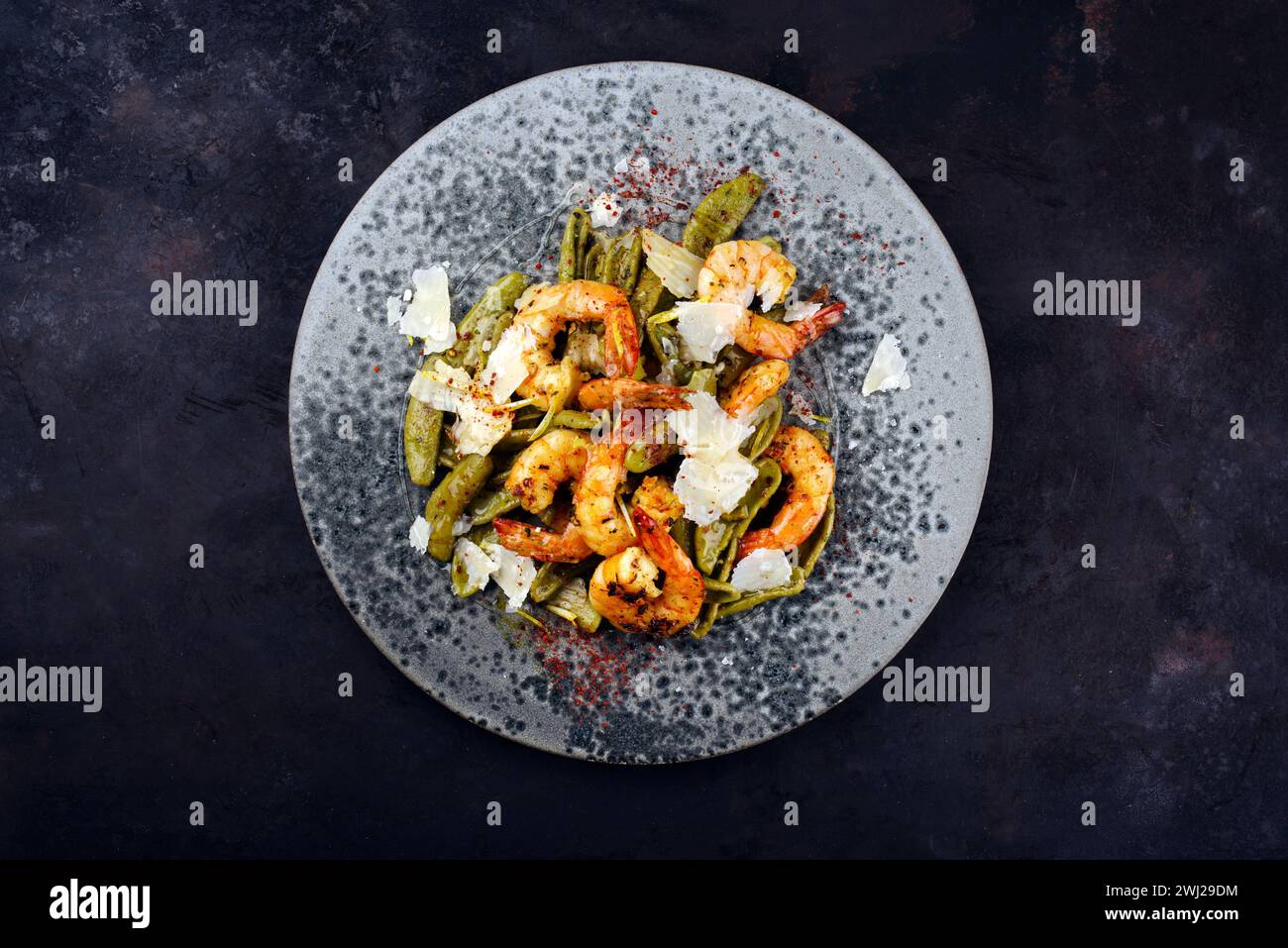 Traditional fried king prawns with Italian foglie di olivo pasta and ...