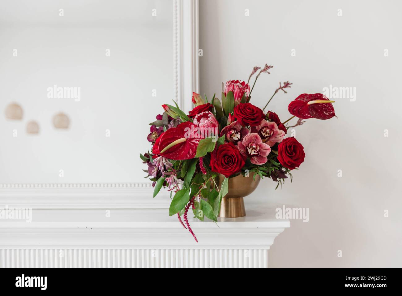 Vibrant arrangement of flowers in shades of red hi-res stock ...