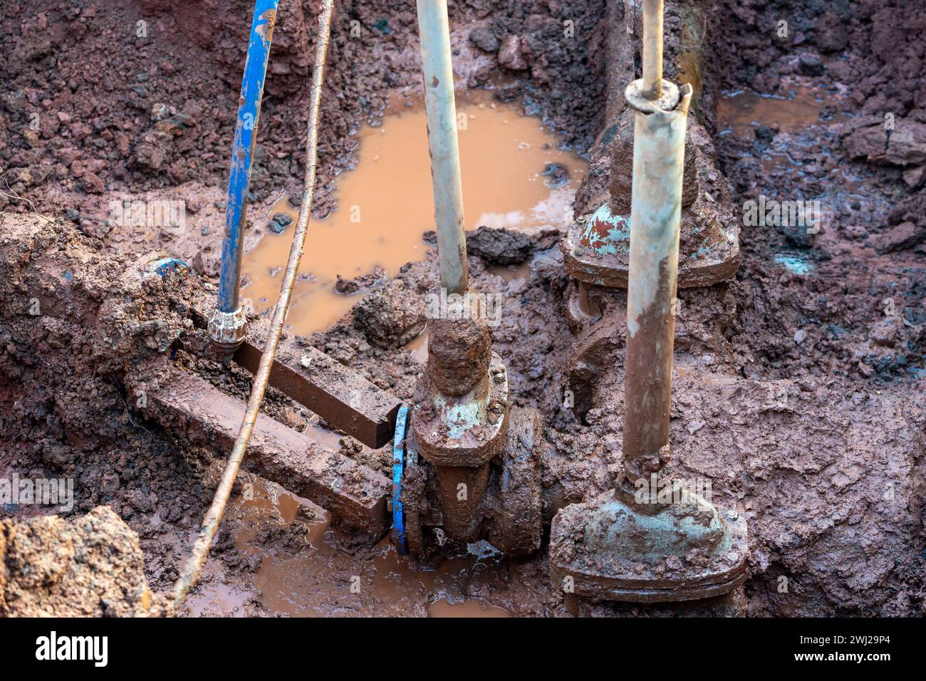Renovation of a water pipe after a burst water pipe on a street Stock ...