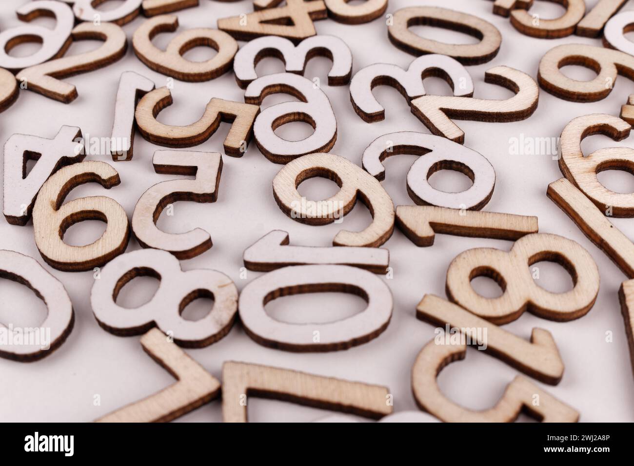 a collection of individual numbers lying isolated on a white background ...